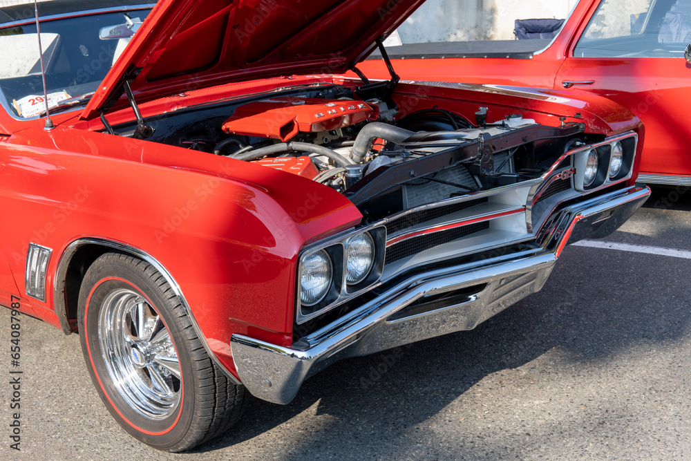 Snohomish, WA, USA - 25 September 2022. Headlights of red Buick GS 400 ...