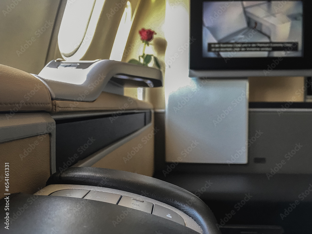 View into First Class cabin with single and double lie flat suite seat ...