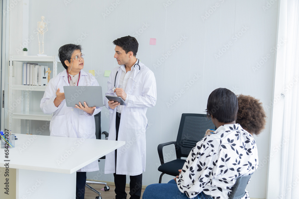 Asian senior elderly 60s physician wearing lab coat and stethoscope ...