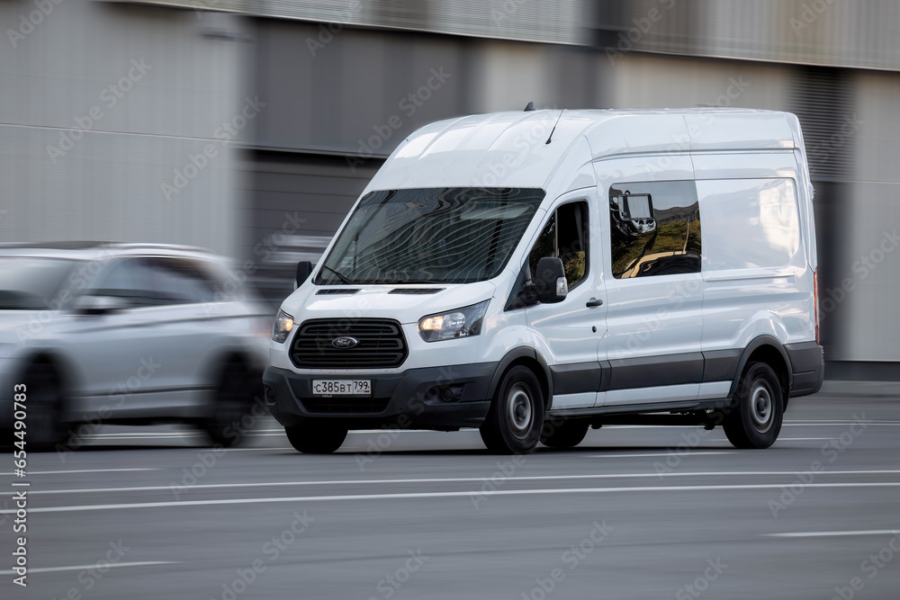 Ford Transit Fourth generation in the city street. Front side view of ...