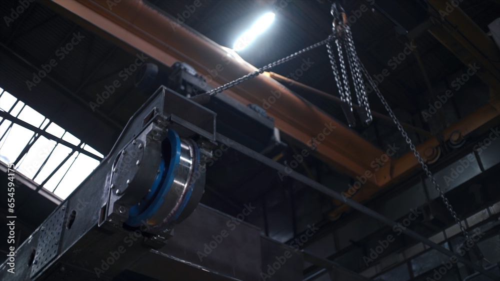 Metal construction on suspensions at factory. Clip. Suspension systems ...