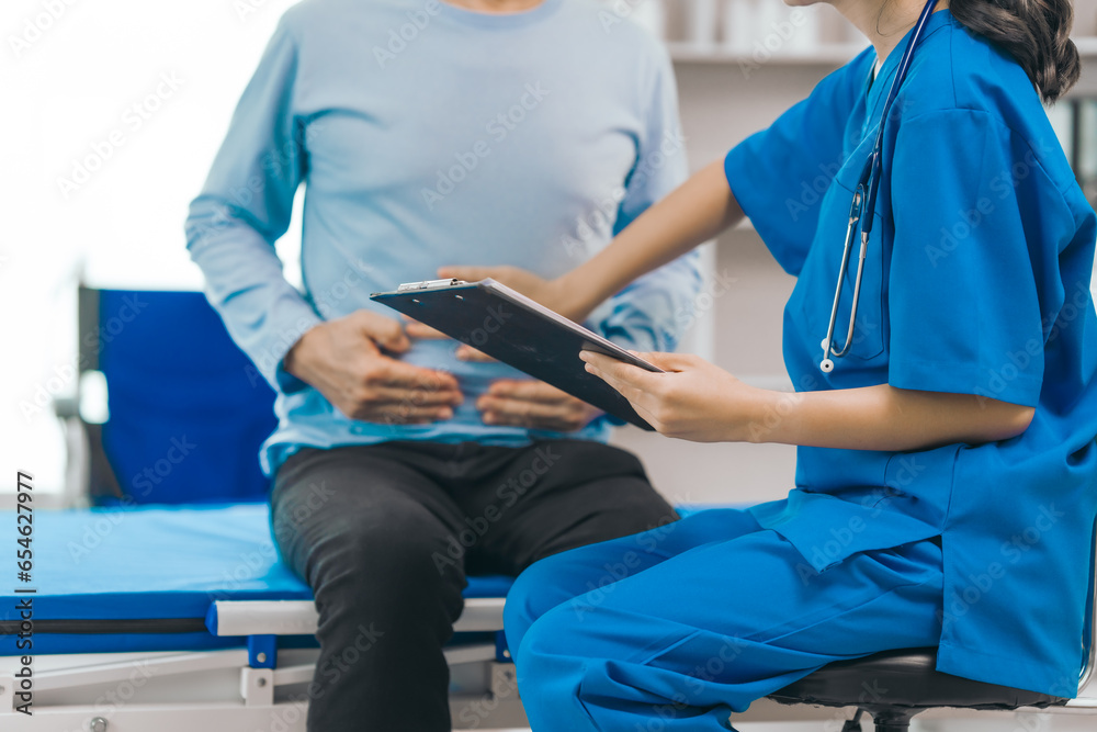Elderly man engages in thoughtful discussion with compassionate asian ...
