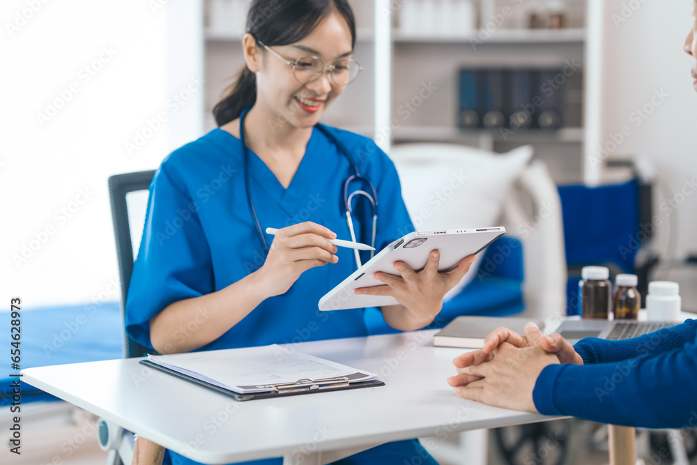 Asian people experienced female doctor giving advice to elderly male ...