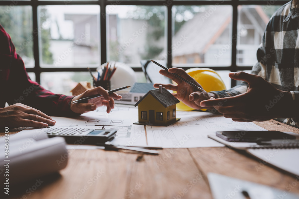 Architects and engineers work together in business, submitting ...