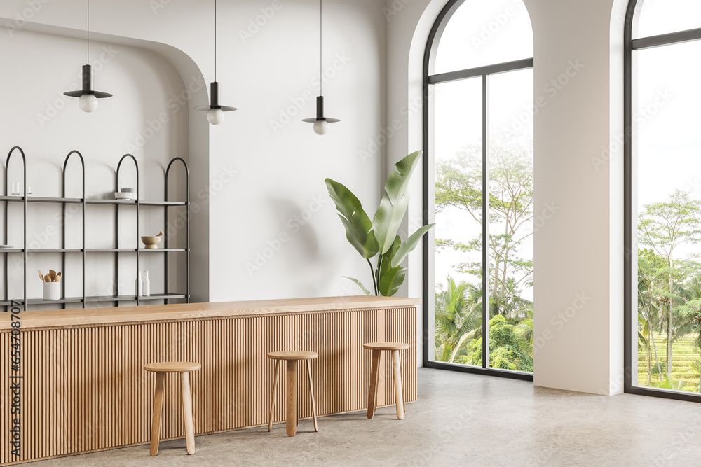 Elegant cafe interior with counter and wooden bar stool near panoramic ...
