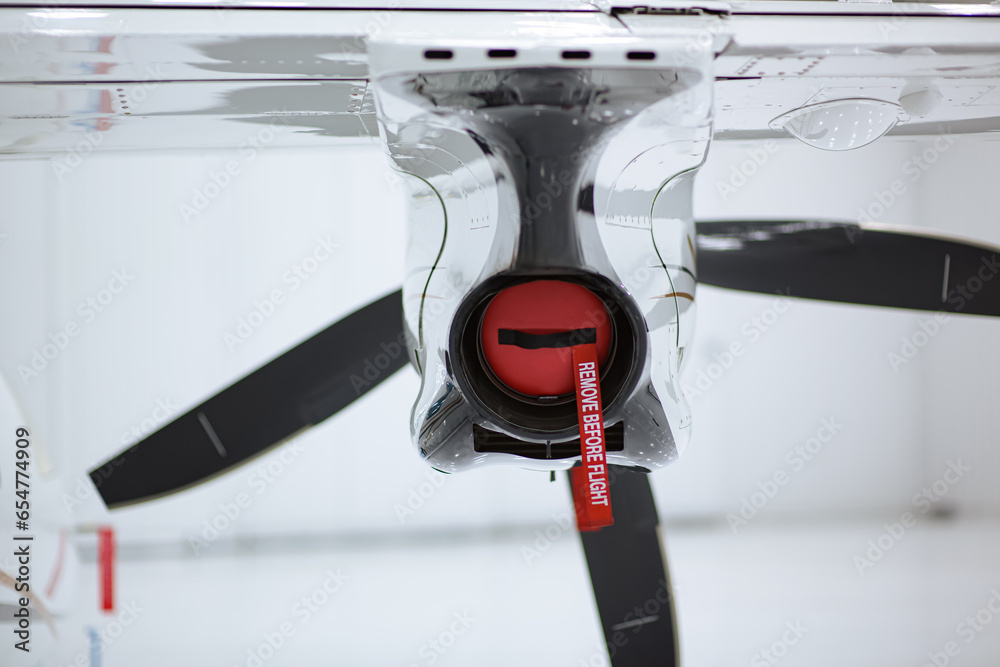 Remove before flight tag and cover for the exhaust port of a turbofan ...