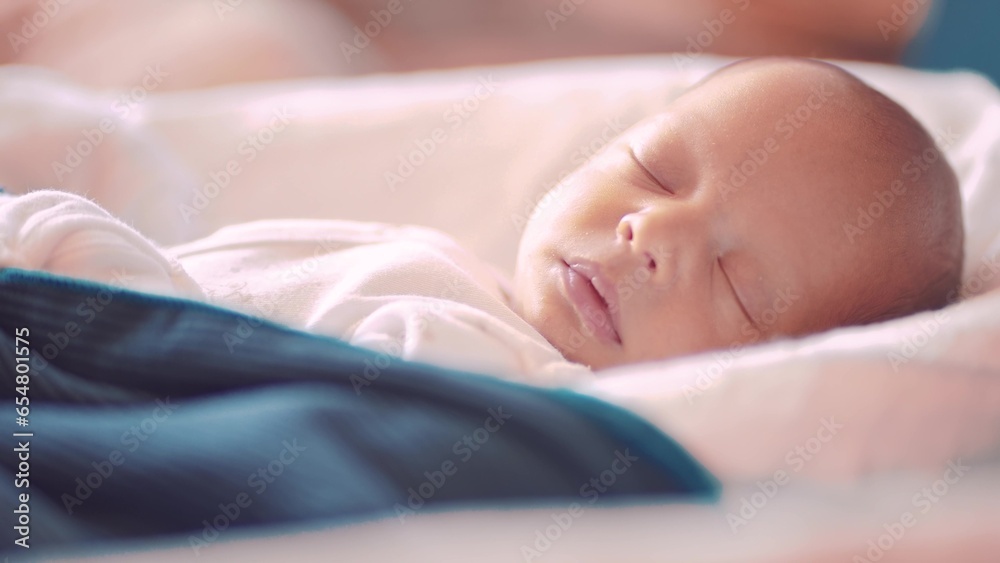 baby sun sleeping newborn close-up. newborn a baby sleeping lying in ...