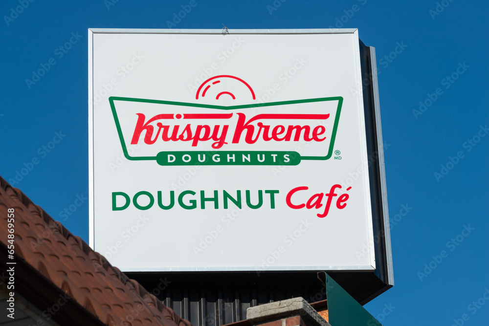 Krispy Kreme Doughnuts (Doughnut Café) billboard at top of a location ...