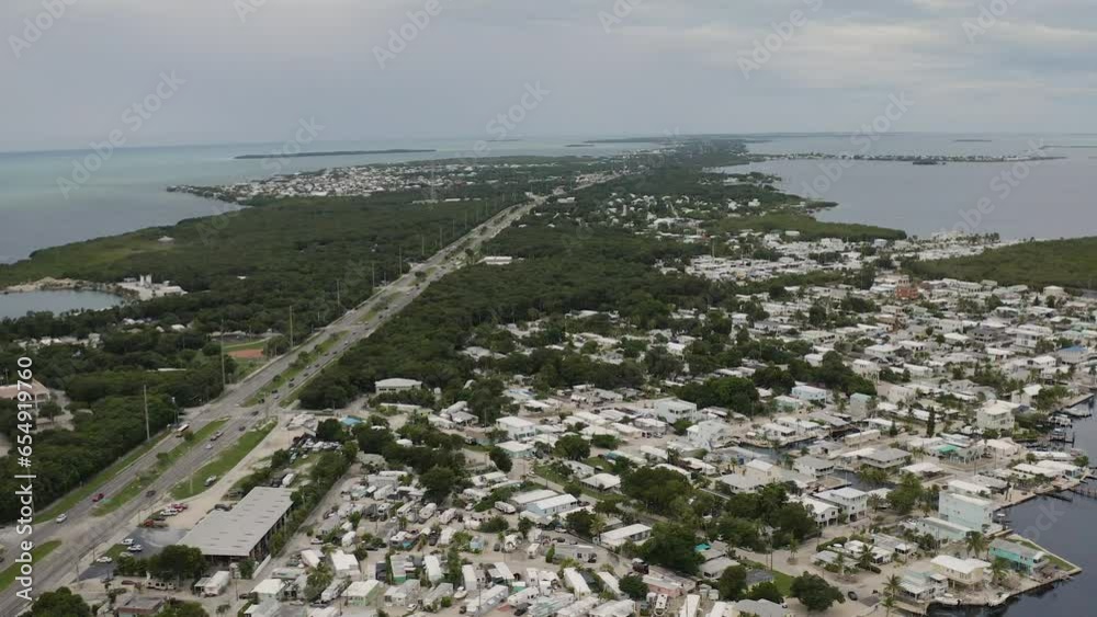 Aerial view of Key Largo, Florida cityscape landscape surronded by ...
