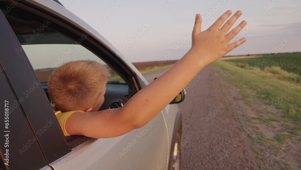 Concept of traveling by car on road. Boy, teenager stretches out his ...