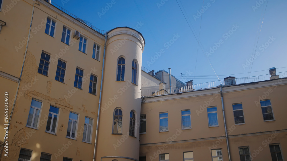 Architecture of old residential building of city. Action. Beautiful ...