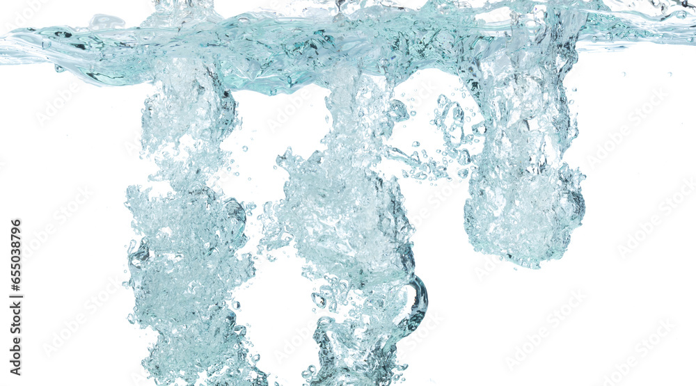 Drinking water pouring into clear glass. Bubbles inside from pouring ...