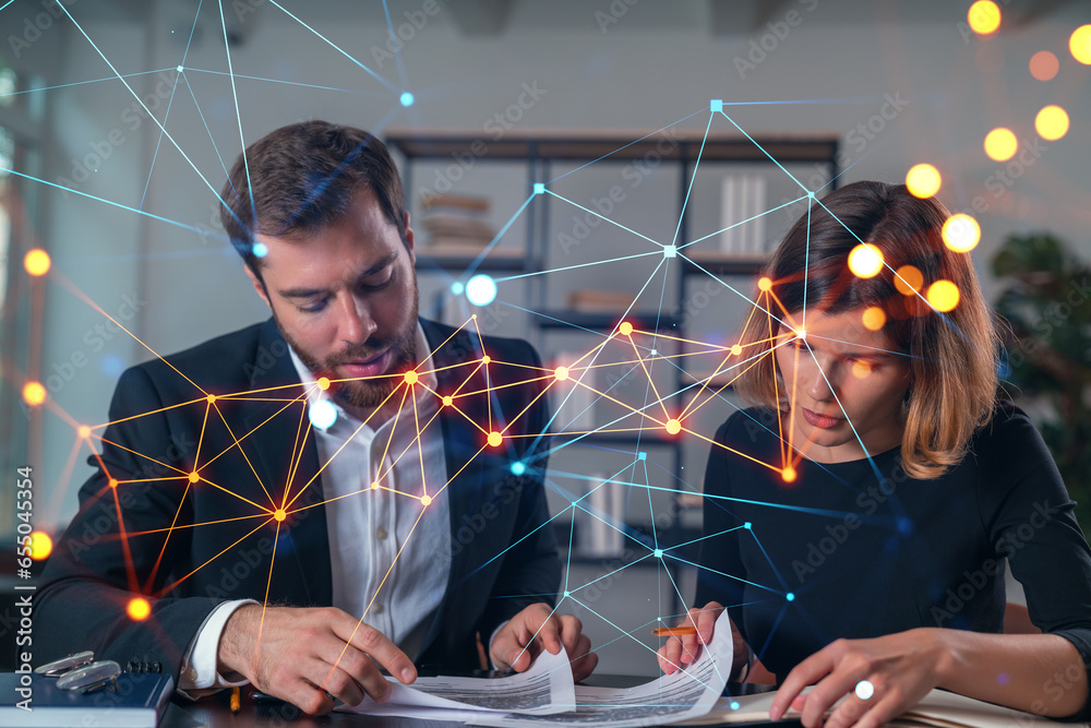 Businesspeople in formal wear taking notes signing contract at office ...