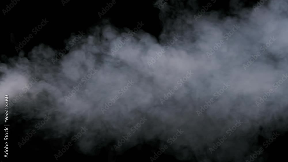 Jet stream of smoke or vapor on black background in slow motion 4K ...