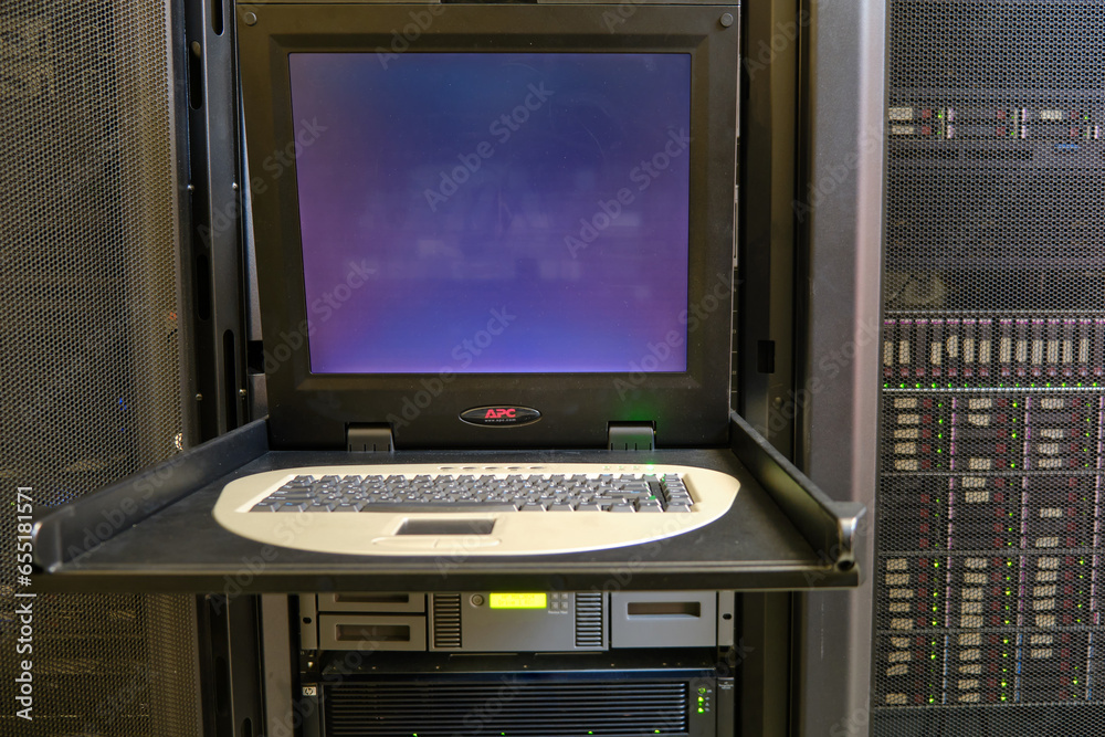 The monitor screen in the server room displays important information ...