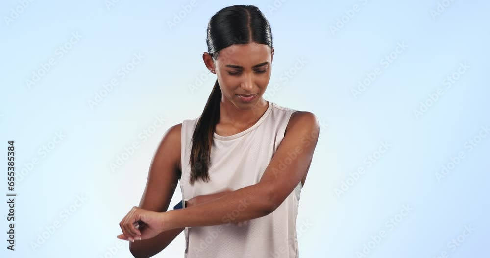 Injury, arm and woman with fitness, pain and inflammation on a blue ...