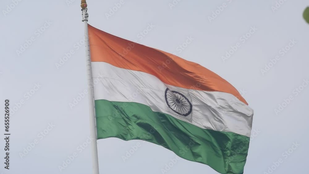 India flag flying high at Connaught Place with pride in blue sky, India ...