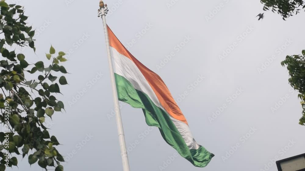 India flag flying high at Connaught Place with pride in blue sky, India ...