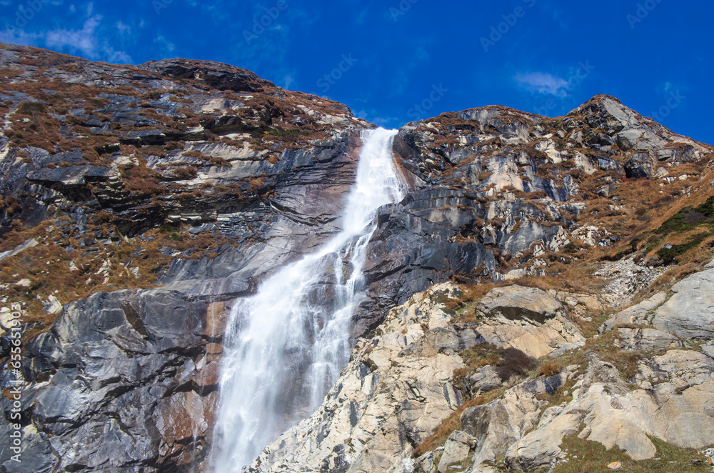 Mountain and Graceful Waterfall. Khando waterfall in Kanchenjunga trek ...