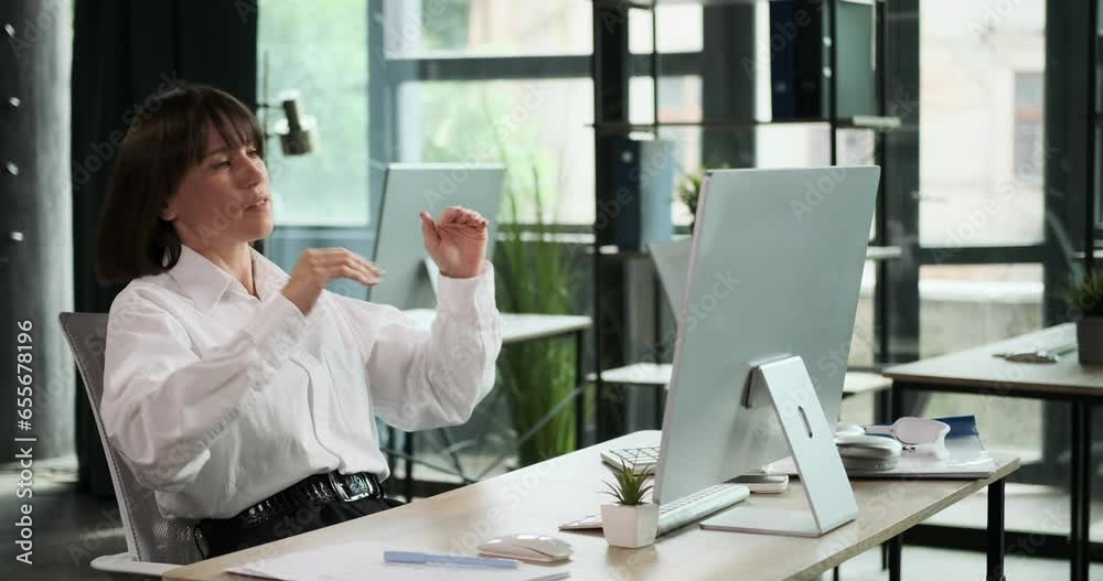 A displeased woman expresses frustration as she faces a setback while ...