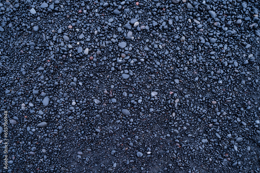Dark pebbles as a background. Round stones on the beach. Photography ...
