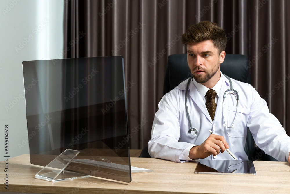 Mock-up template. Doctors look at display, review patient information ...