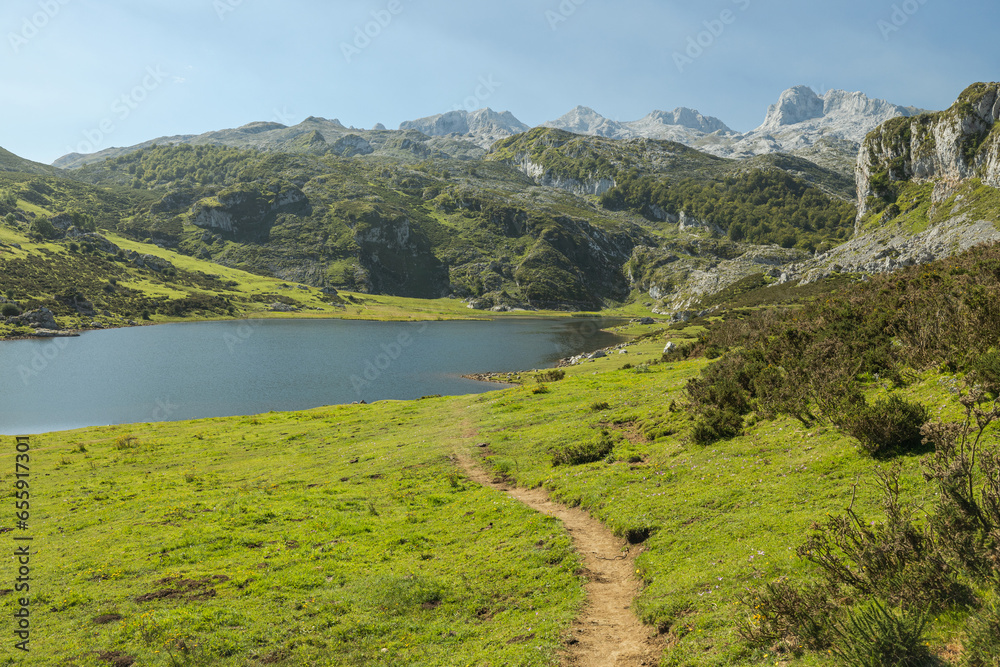 A beautiful pathway along a peaceful field and meadow in the Spanish ...