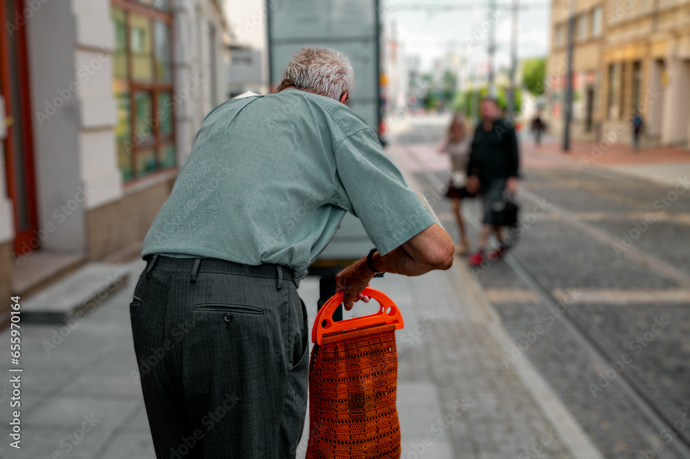 Old man with a bag. Hunchbacked grandfather, old age and wisdom. Stock ...