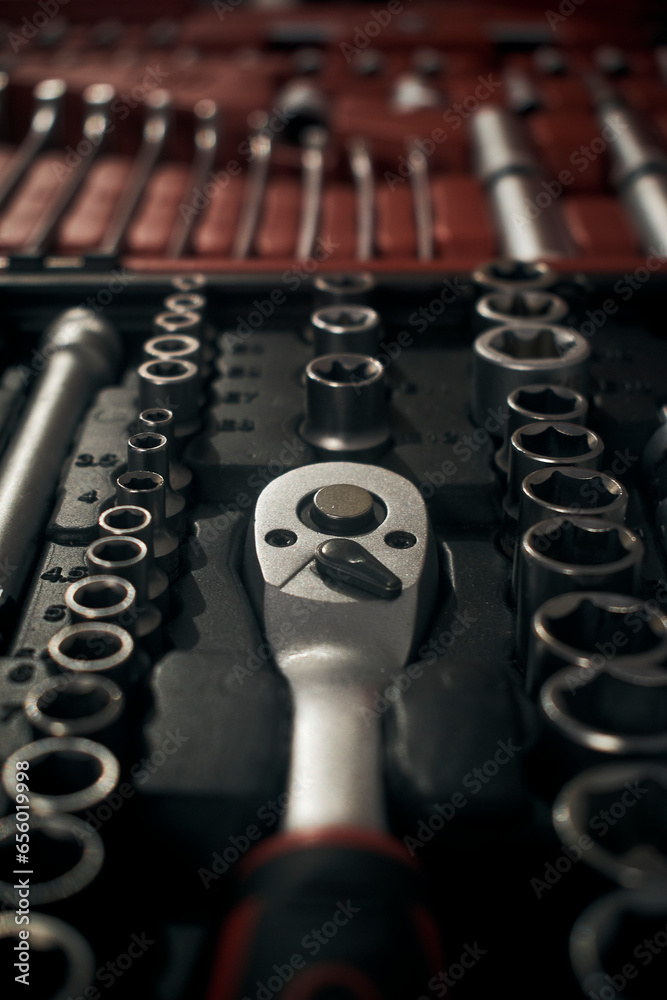 Ratchet and wrench socket in toolkit Stock Photo | Adobe Stock