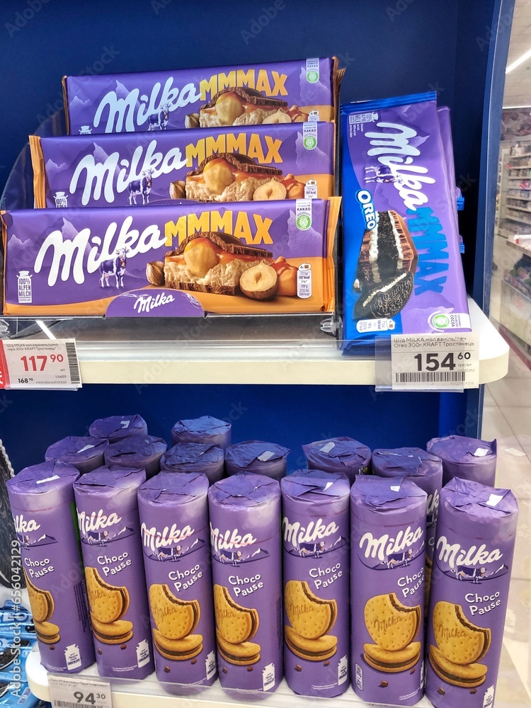 25.09.2023, Ukraine, Kharkiv, Milka chocolate on store shelves. Many ...