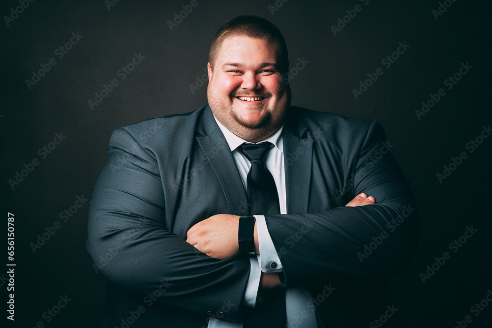 Fat man who is smiling and crossing her arms Stock Photo | Adobe Stock