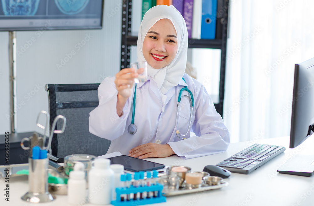 Asian professional successful experienced muslim female doctor ...