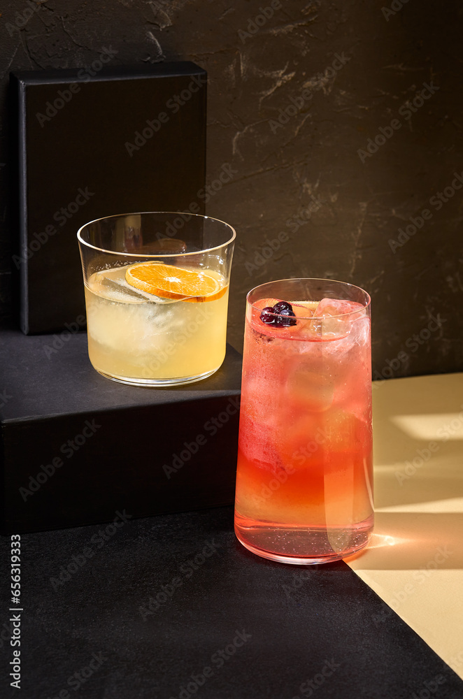 Striking alcoholic cocktails based on brandy and whiskey, displayed ...