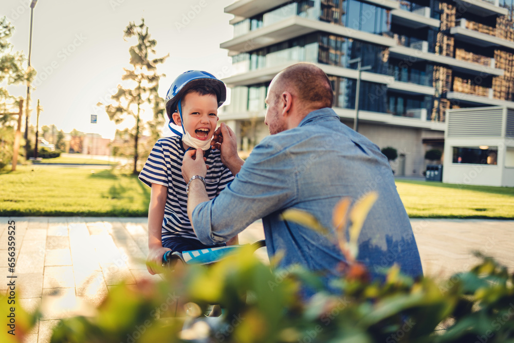 Parent putting mask on boy child during covid-19 outbreak, Kid in ...