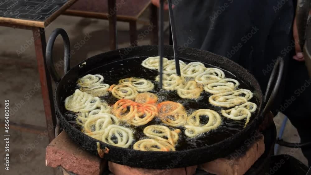 Video „Footage, Chef Making Jalebi Also Known As Jilapi, Jilebi, Jilipi ...