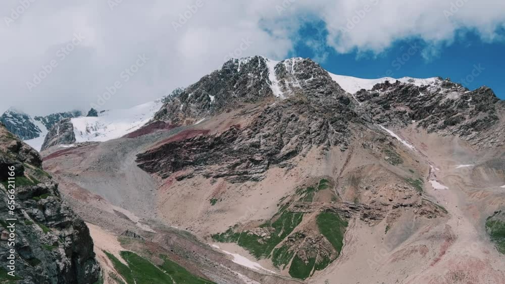 View of Lenin Peak, one of the highest peaks of Central Asia. The Pamir ...