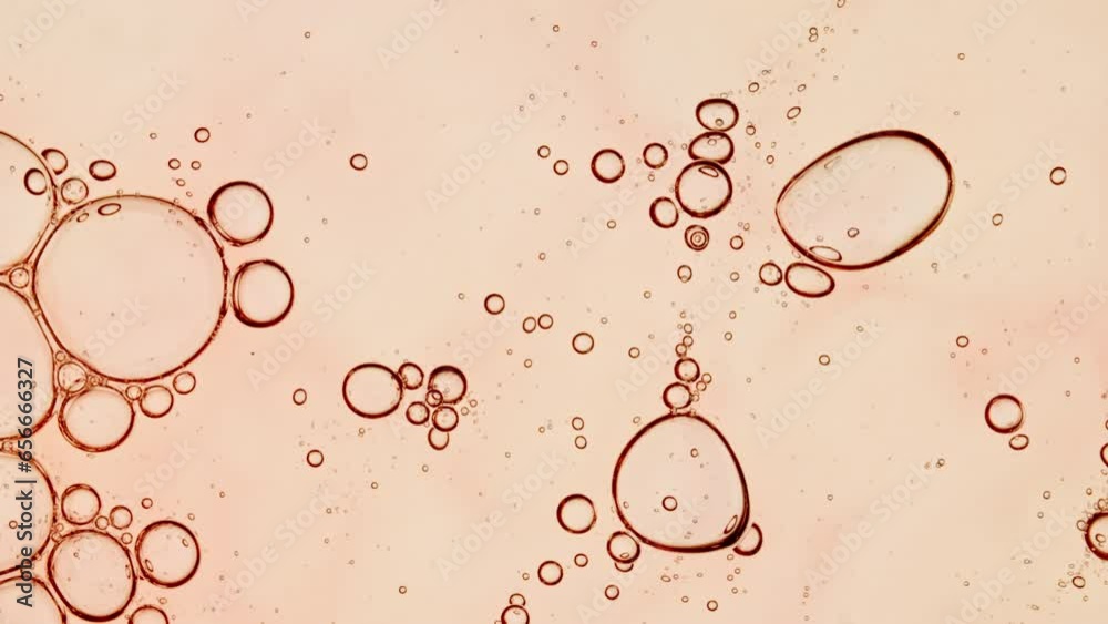 Bubble cluster, cells under a microscope. Transparent cosmetic gel ...