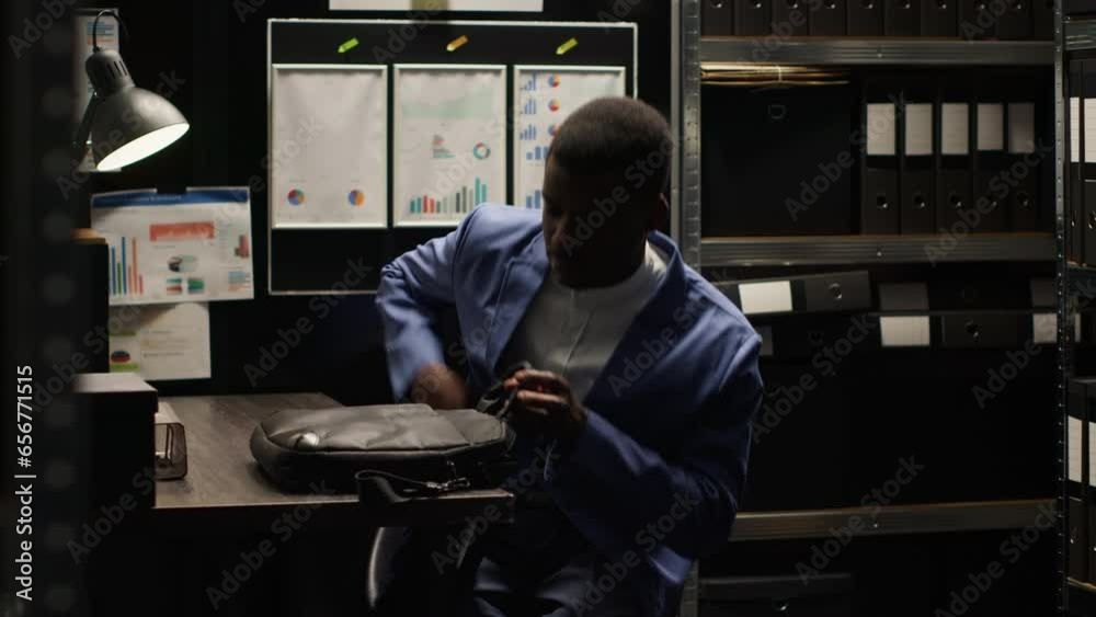 African American investigator arrives office in adorned with crime ...