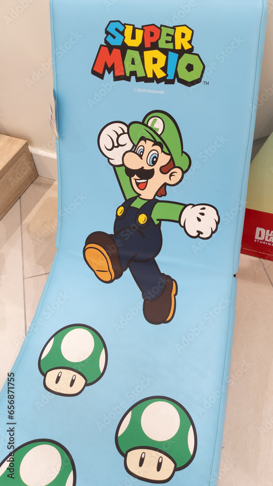 Supermario Bros character Super Mario Luigi figurine on fabric relax ...