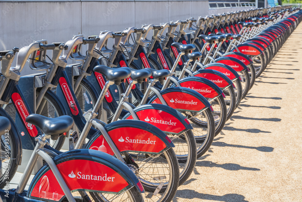 Santander Cycles bikes docked in a row at Aquatic Centre, Queen ...