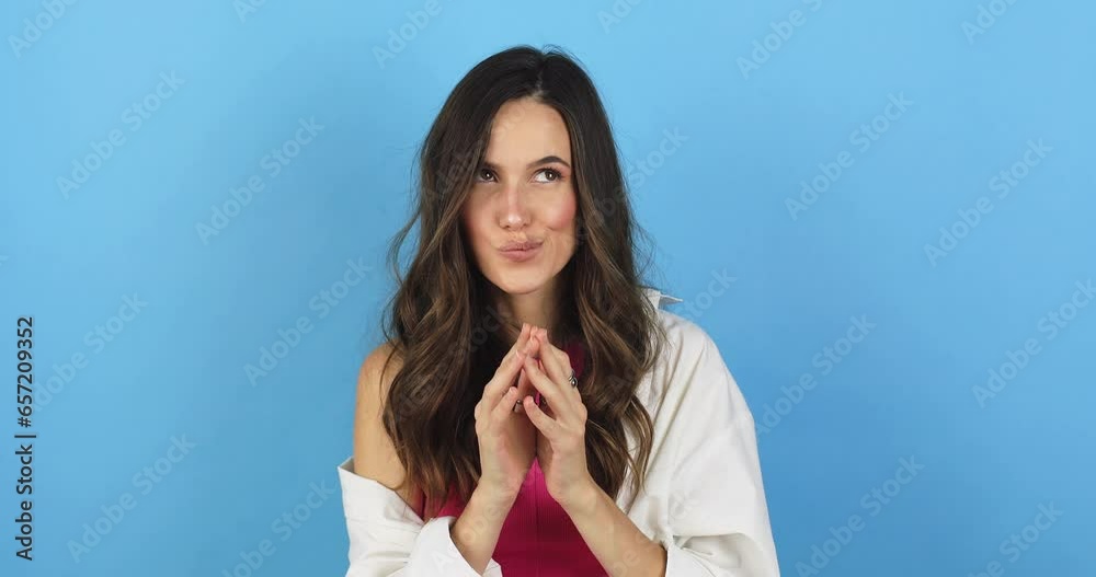 Mysterious sly woman steeple fingers and schemes something tries to ...