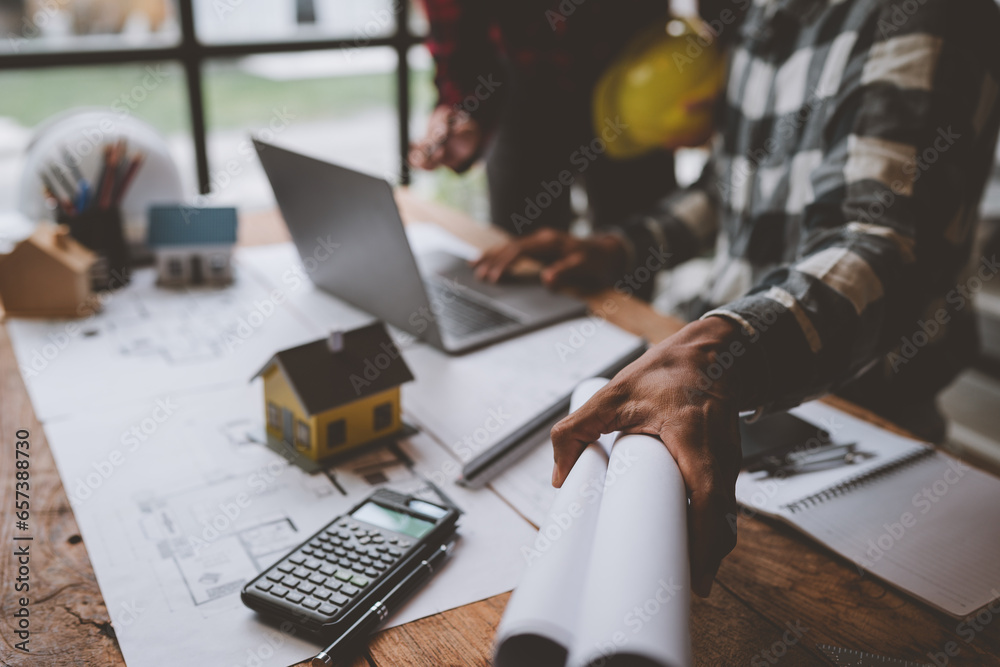 Architects and engineers work together in business, submitting ...