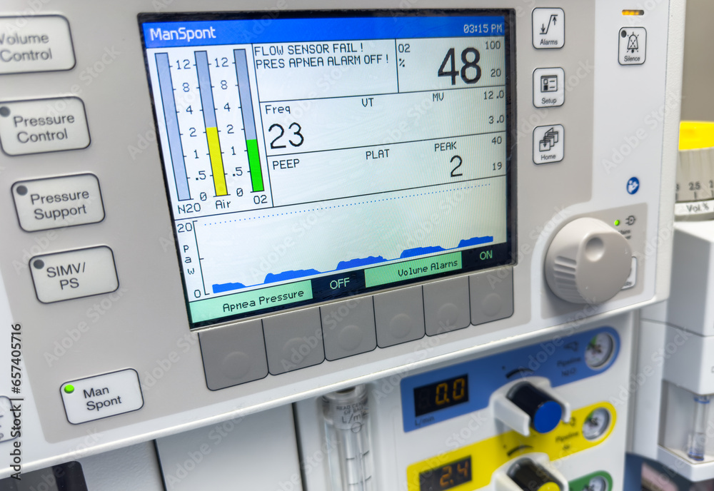 Medical monitor displays vital signs with graphs and numbers, heart ...
