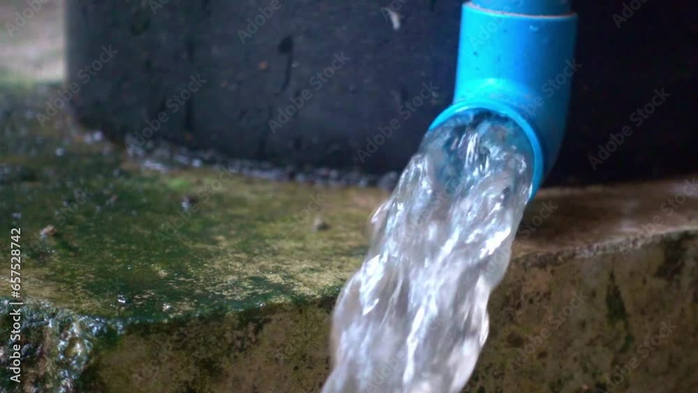 PVC Pipe with Flowing Water from a Filtration System for Waste Runoff ...