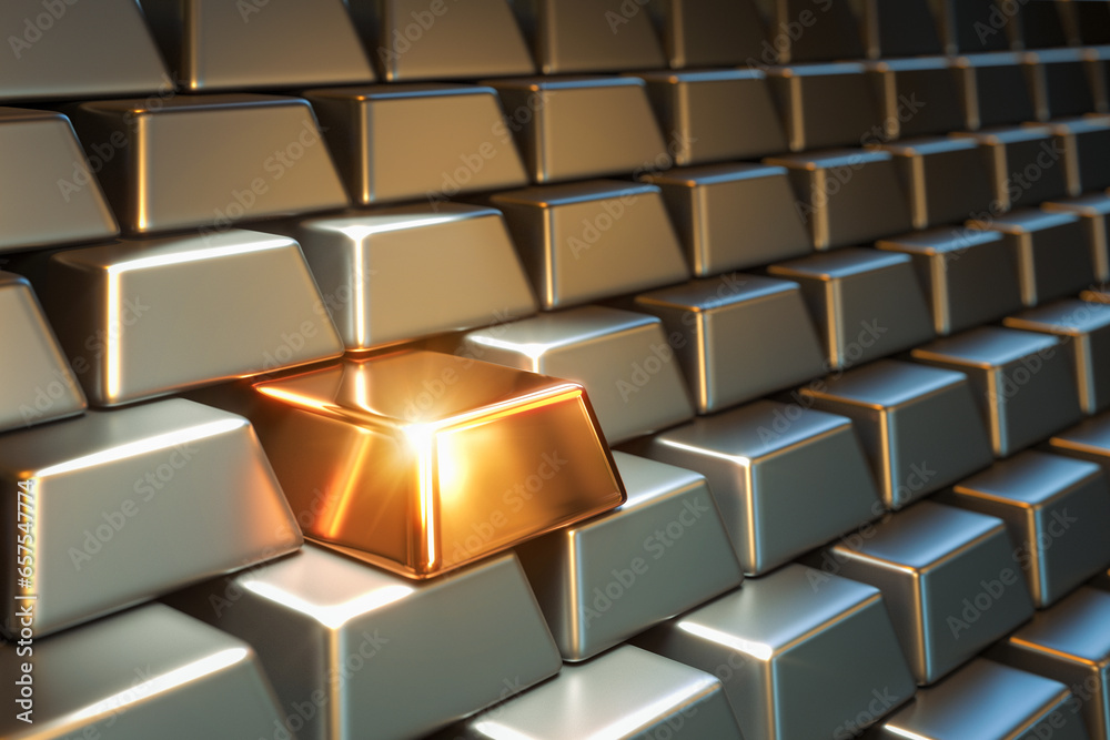 Gold bullion among silver. A lot of stacked silver ingots bars and one ...