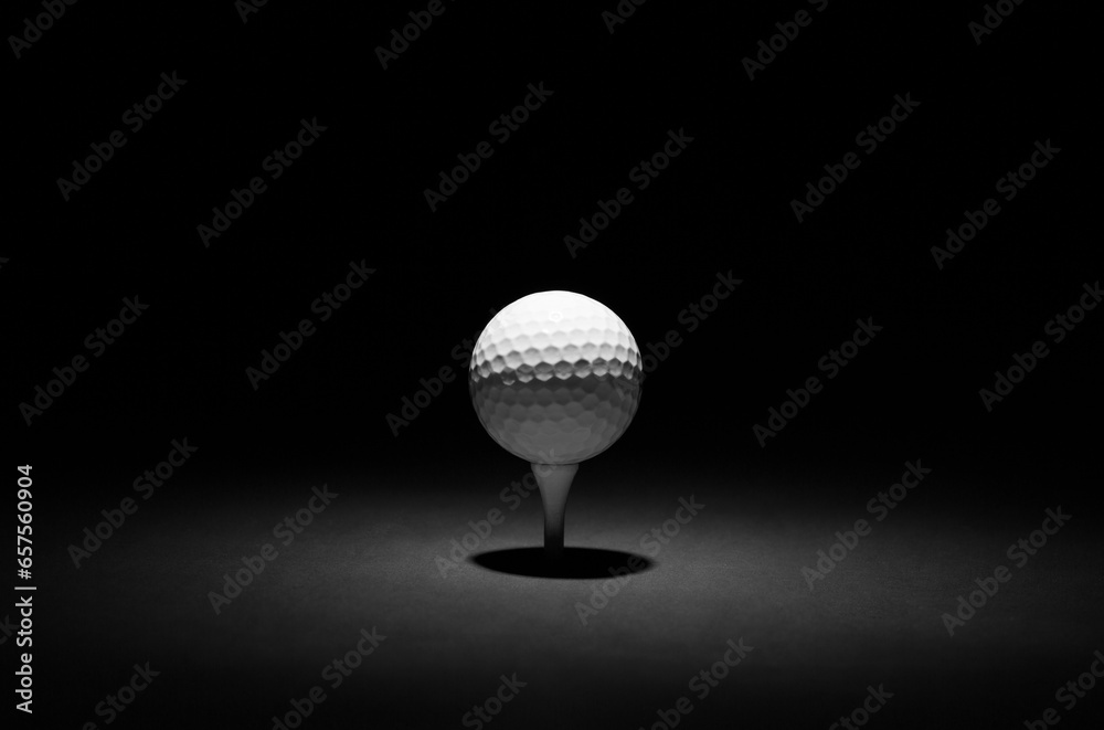Golf Ball Spotlit on a Black and Gun-Metal Background. A Moody Studio ...