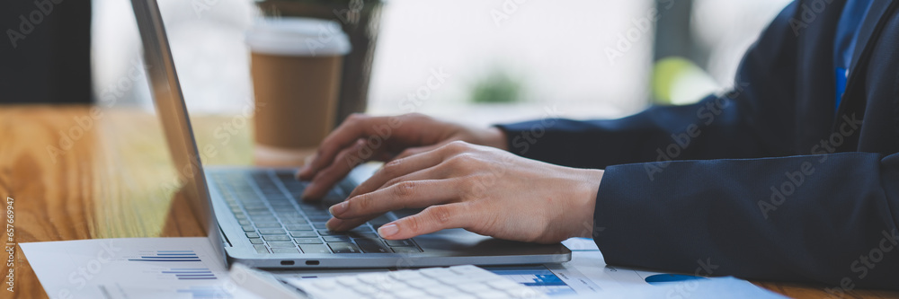 Project revenue and profit accounting businesswoman working with laptop ...