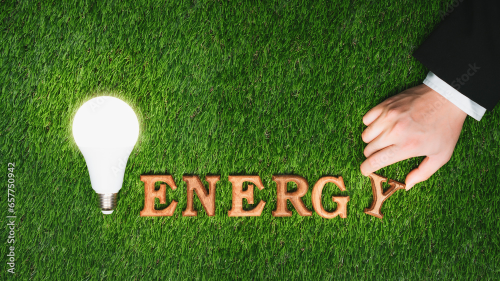 Hand arrange wooden alphabet in ECO awareness campaign on biophilia ...