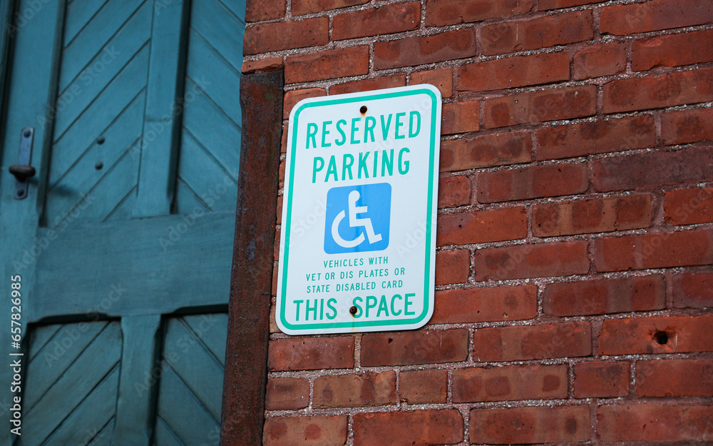 handicap wheelchair-accessible sign against a blurred background ...