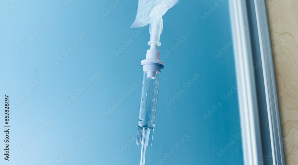 hospital IV drip, with translucent tubing and liquid medication flowing ...
